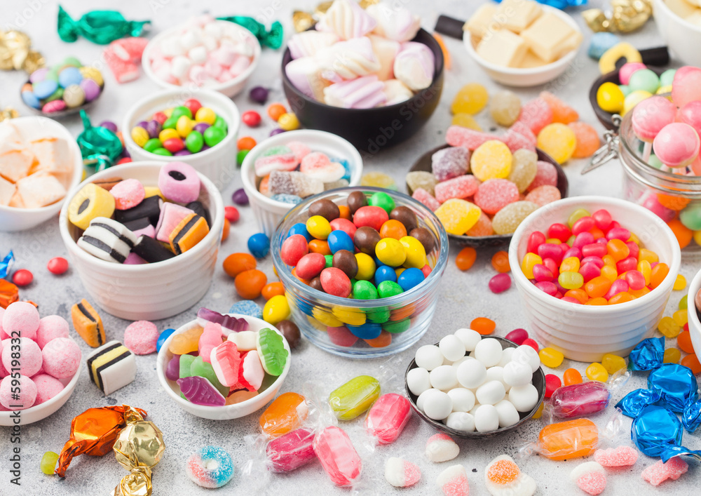 Milk chocolate candies woth shell in jar with various jelly gums ...