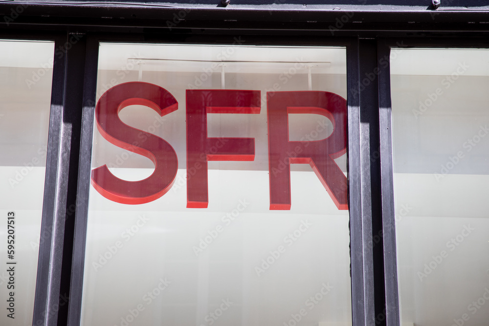 SFR logo sign and text on store agency french phone operator red brand ...