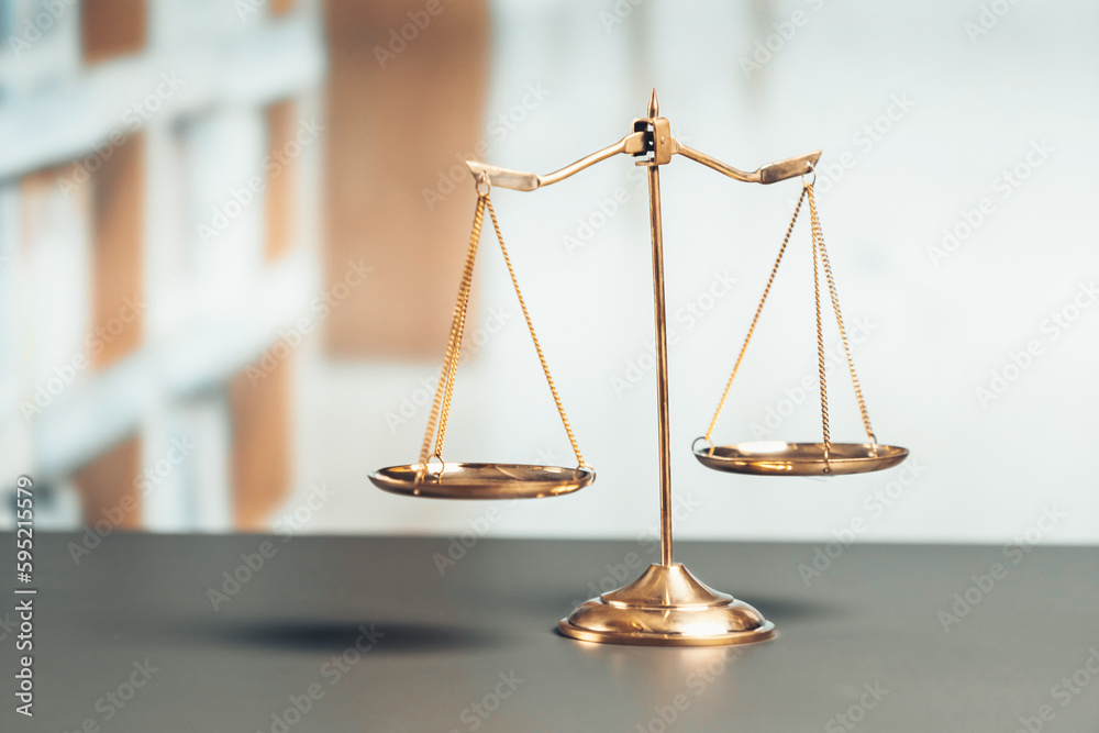 Shiny golden balanced scale in court library background as concept ...