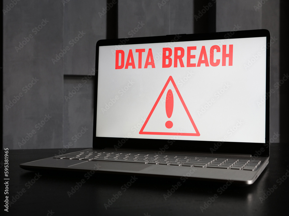 Data breach is shown using the text on the screen of laptop Stock Photo ...