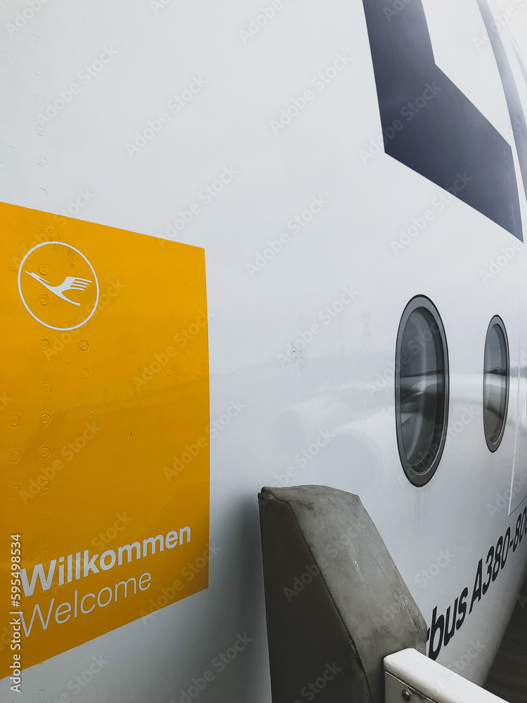 Partial view of Lufthansa A380 fuselage with welcome panel at door ...