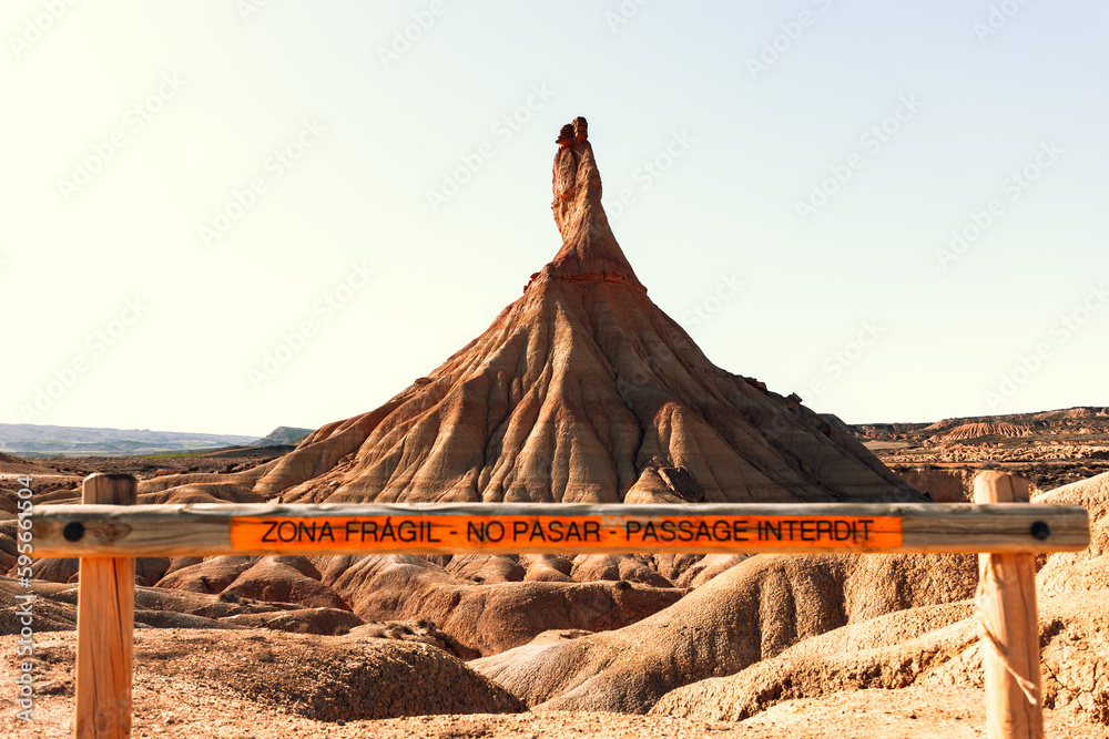 Warning sign against rock formation in desert Stock Photo | Adobe Stock