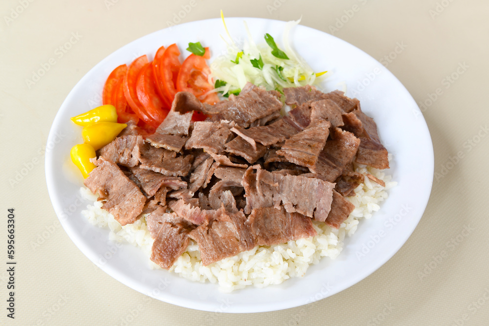 Turkish and Arabic Traditional Ramadan doner kebab with tasty tomato ...