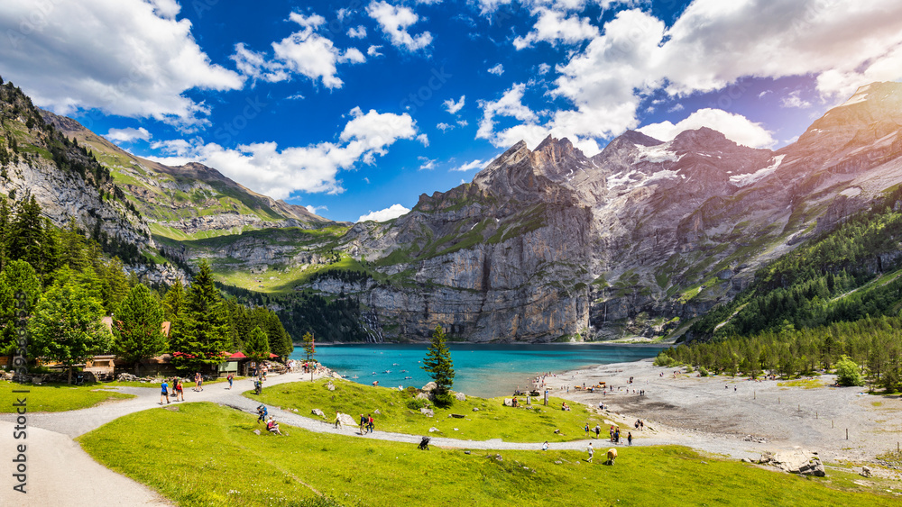 Fotografia do Stock: Famous Oeschinensee with Bluemlisalp mountain on a ...
