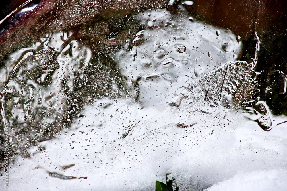 Abstract ice pattern and drawing appearing on the surface of the water ...