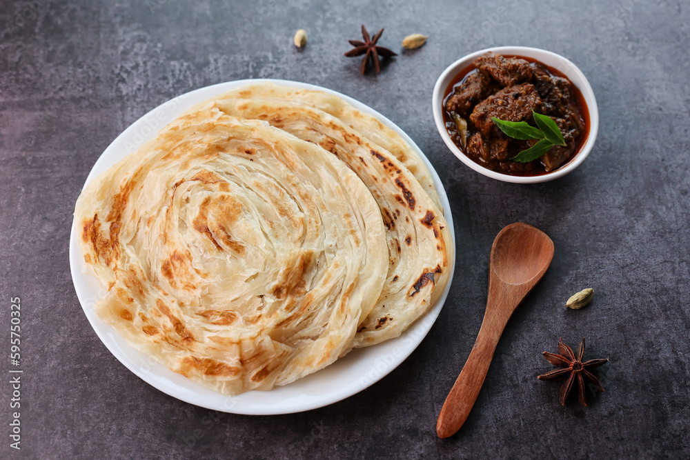 Beef curry with Kerala parathas porotta roti parotta barotta naan ...