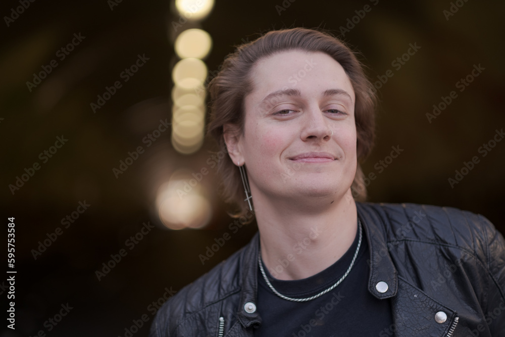 A genderfluid (LGBTQ) model poses outside, in front of a tunnel, to ...