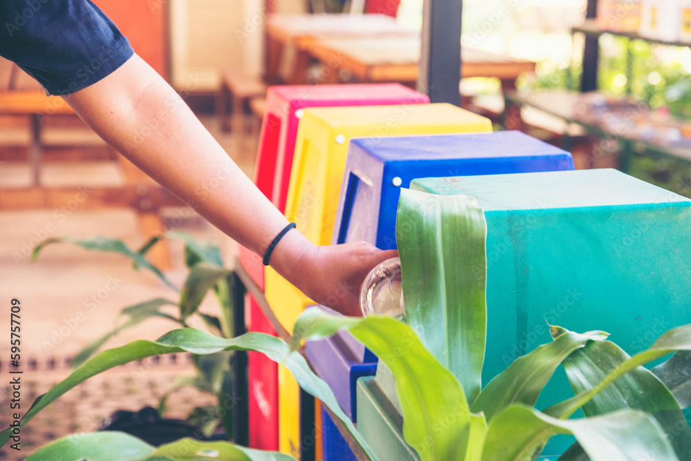 Men hands trow Trash cans for sorting garbage recycle bin waste plastic ...