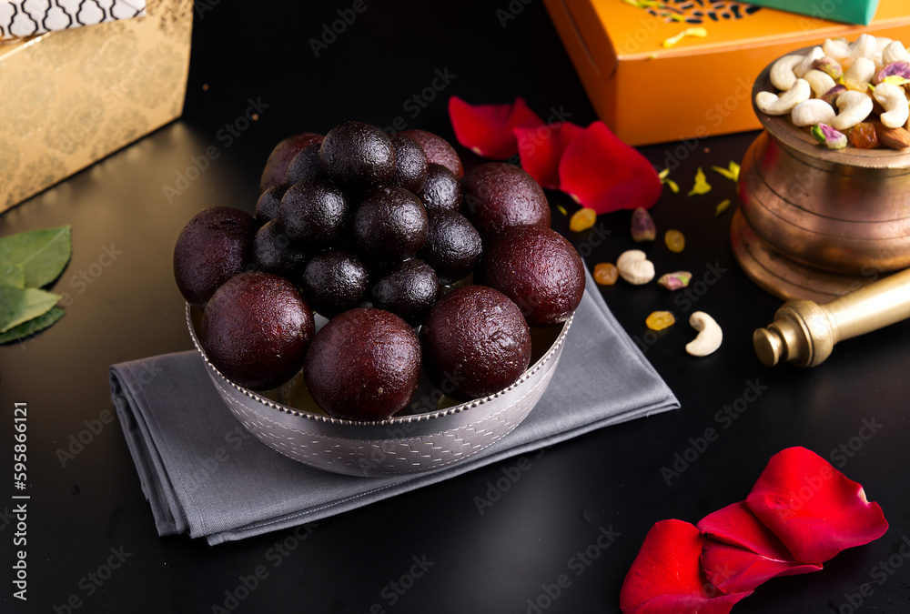 Gulab jamun is a sweet confectionery or dessert, originating in the ...