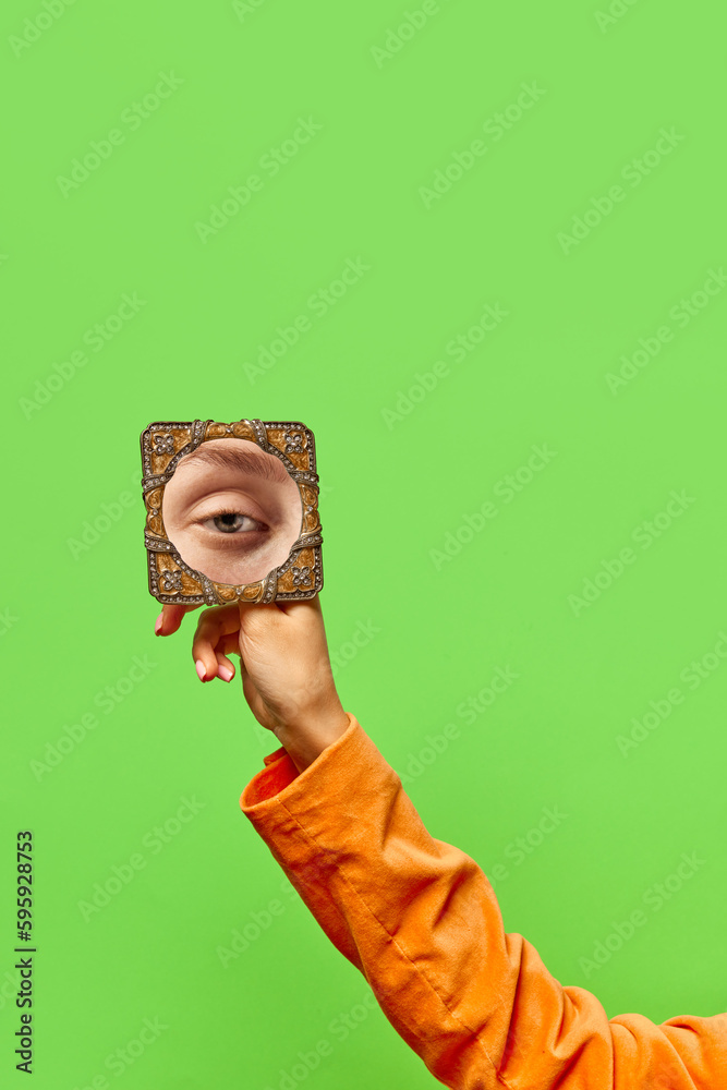 Vintage style. Female hand holding small mirror with reflection of sad ...