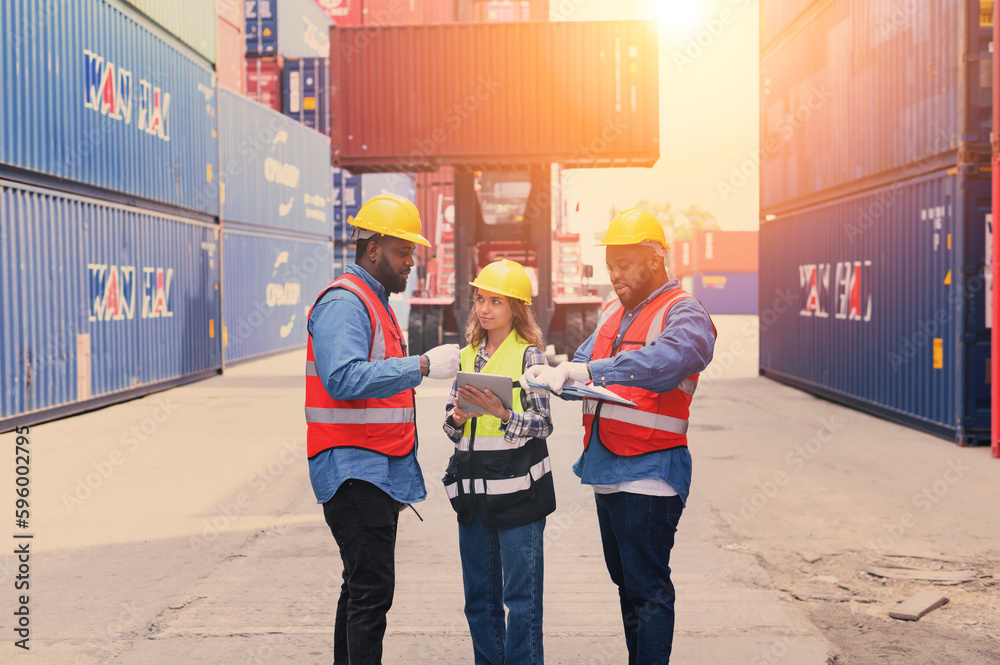 Group of men and women of professional container operators standing in ...