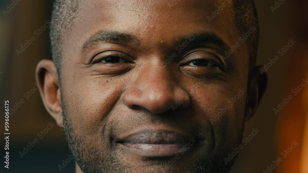 Close-up portrait male face mature smiling african american man with ...