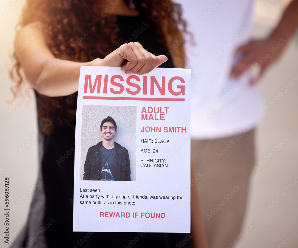 Bring back our loved ones. a woman holding a missing persons flyer ...