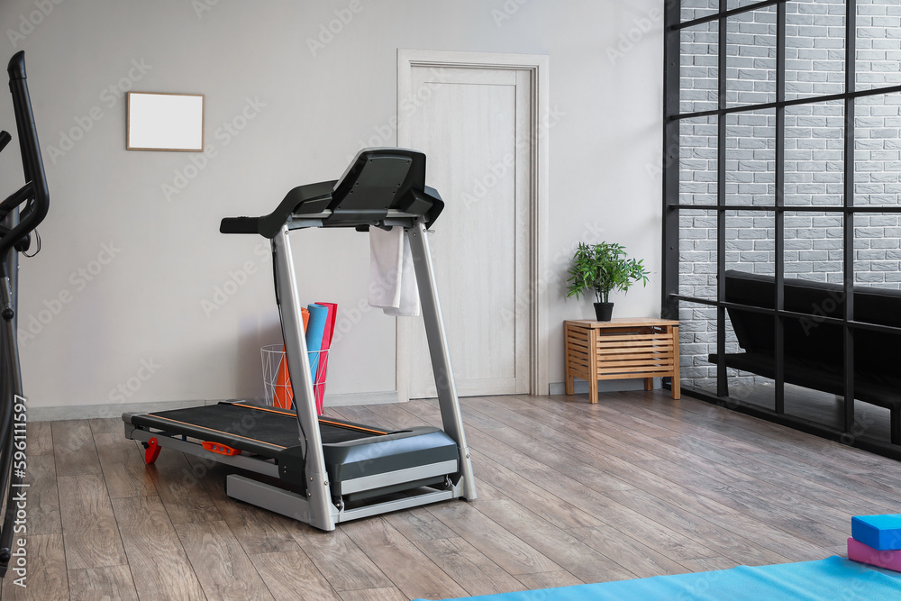 Interior of gym with modern treadmill and sport equipment Stock Photo ...