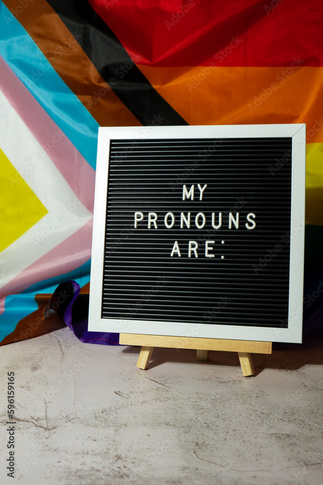 MY PRONOUNS ARE text Neo pronouns concept on Rainbow flag background ...