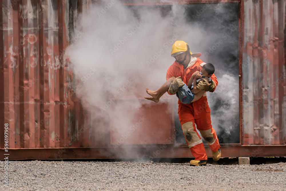 The firefighter's face was covered in soot but he remained focused on ...