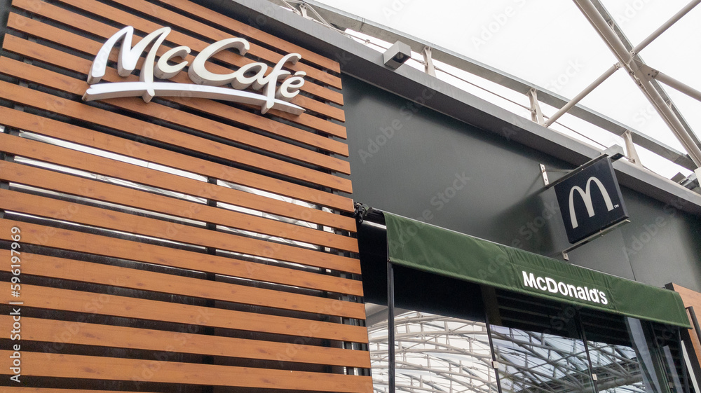 Mccafe McDonald's logo sign of fast food store front text brand chain ...