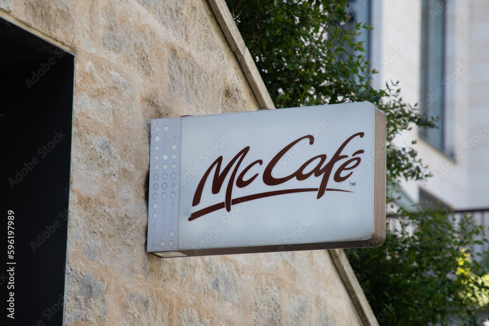mccafe brand sign and text logo of McDonlads fast food store front ...
