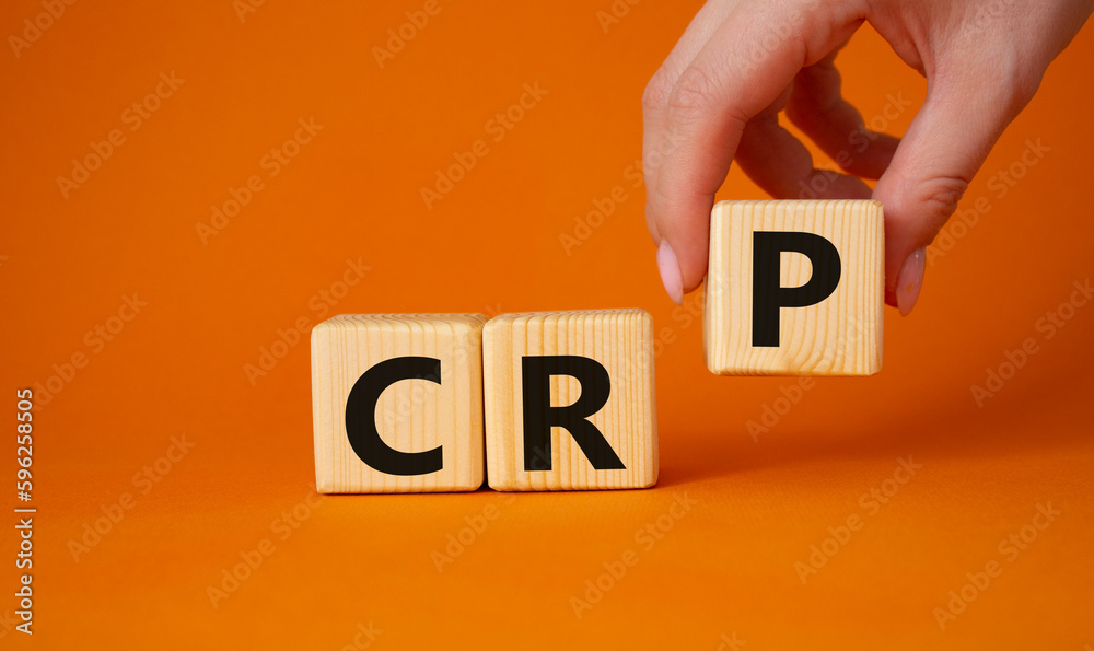 CRP - C-Reactive Protein Test symbol. Wooden cubes with word CRP ...
