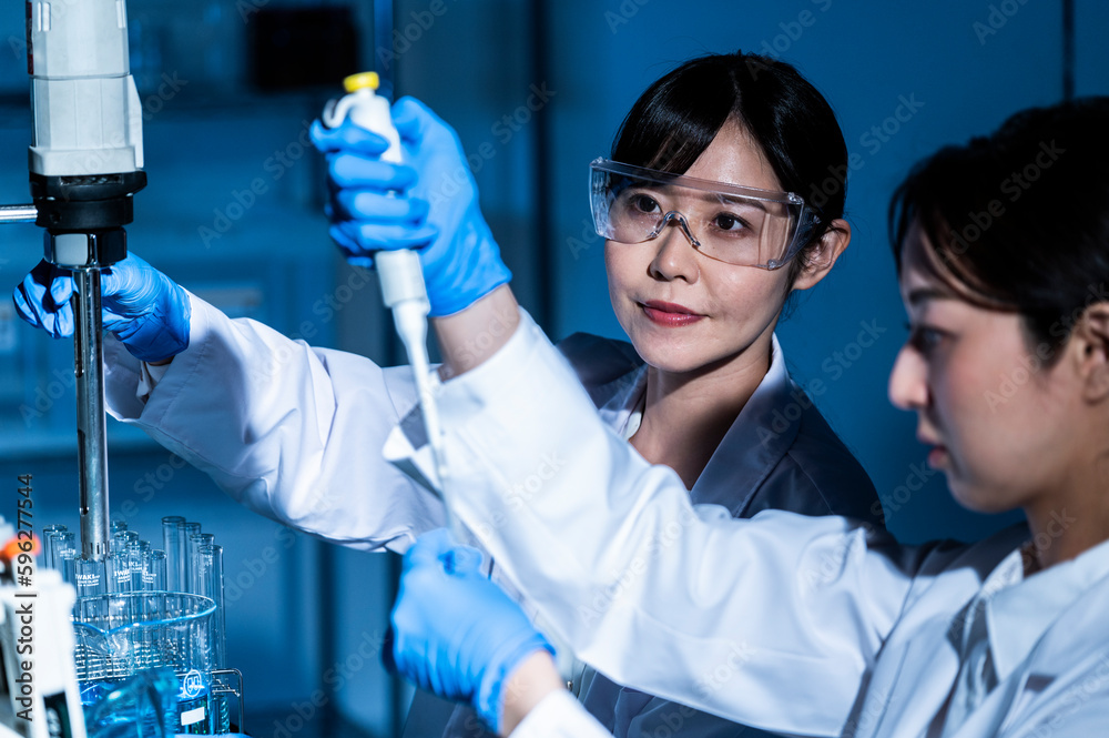 Professional health care researchers working in a medical science ...