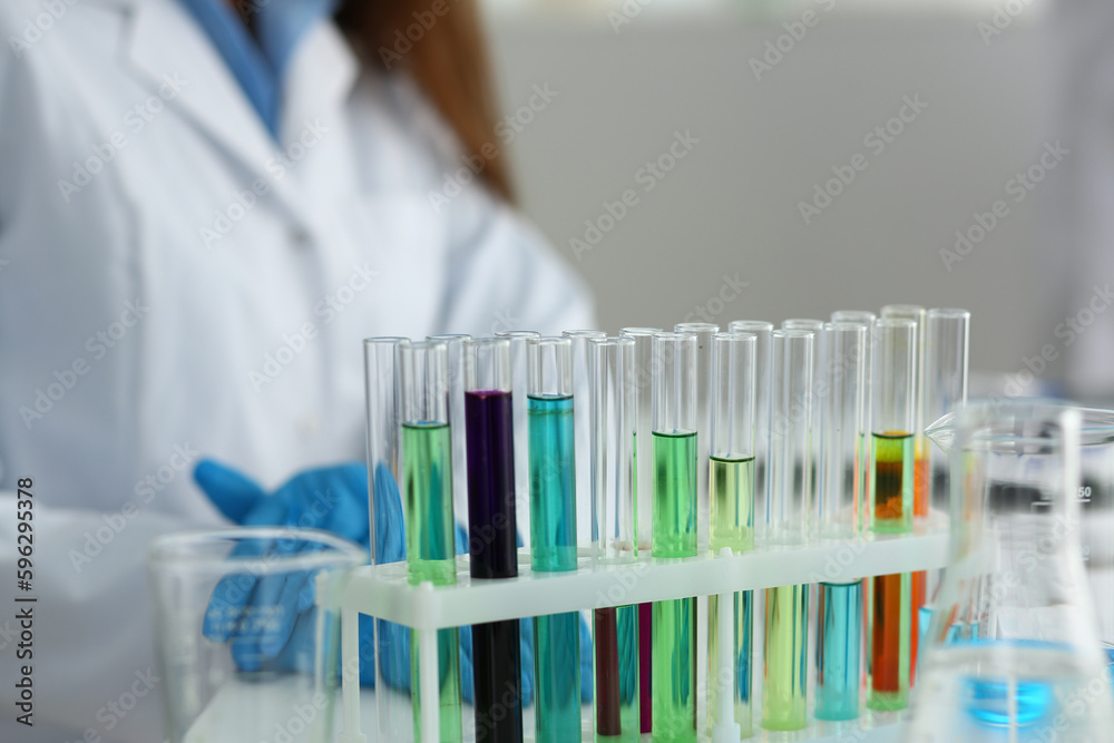 Colored toxic and poisonous liquids in test tubes in laboratory ...