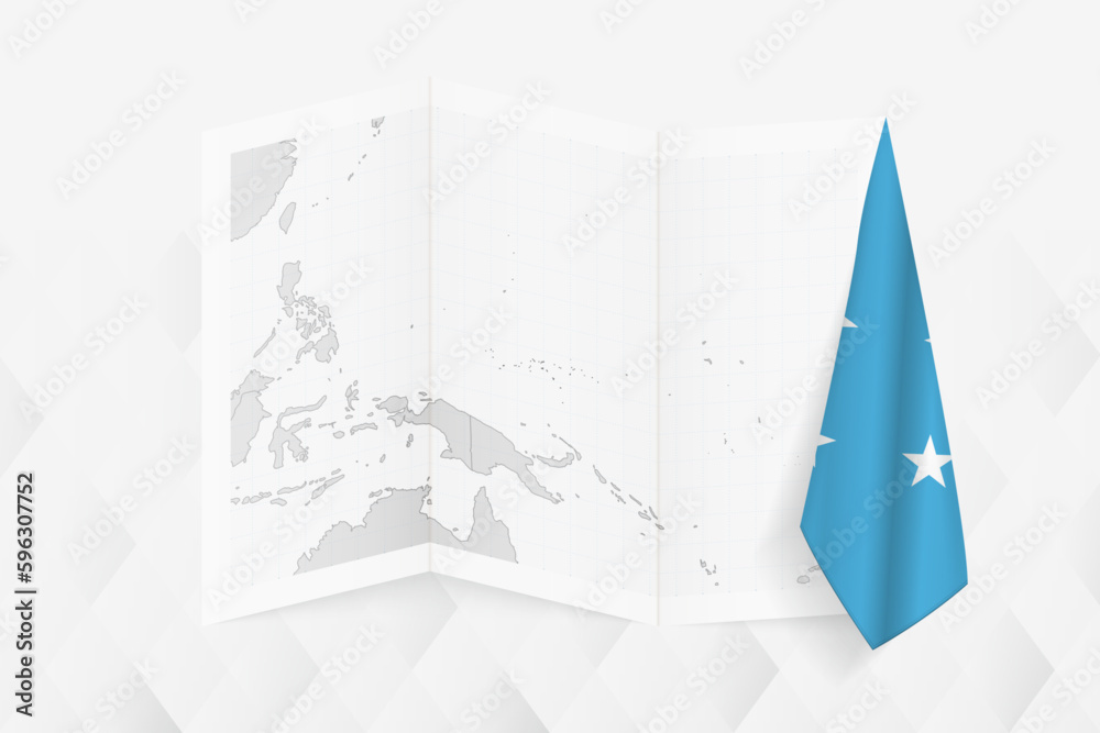 A grayscale map of Micronesia with a hanging Micronesian flag on one ...