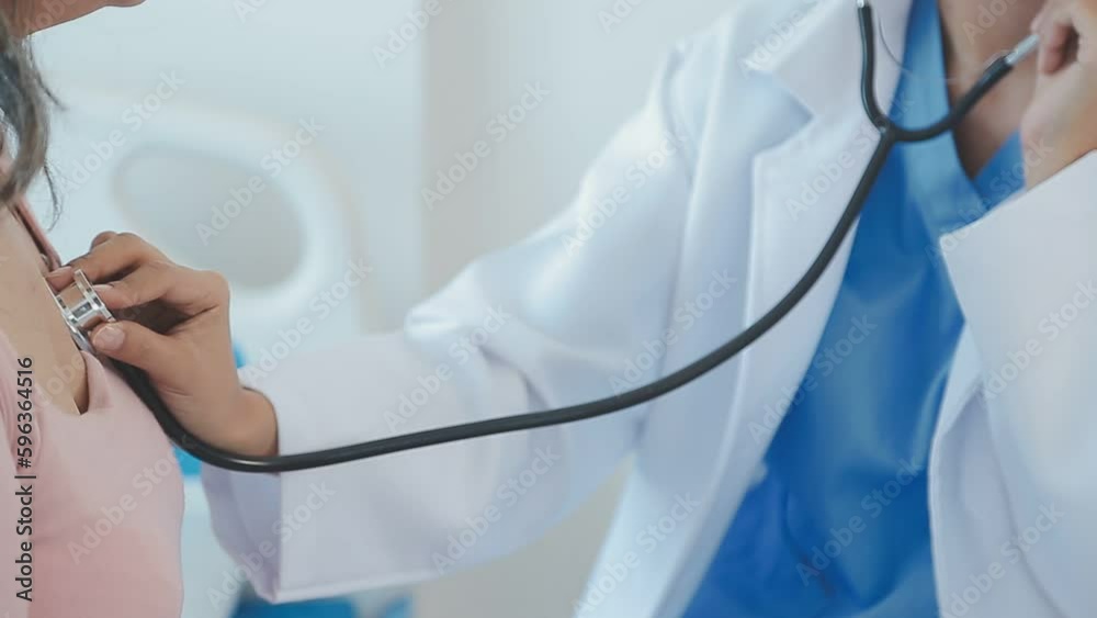 Doctor use stethoscope, checking up heart beat, lunch of auscultation ...