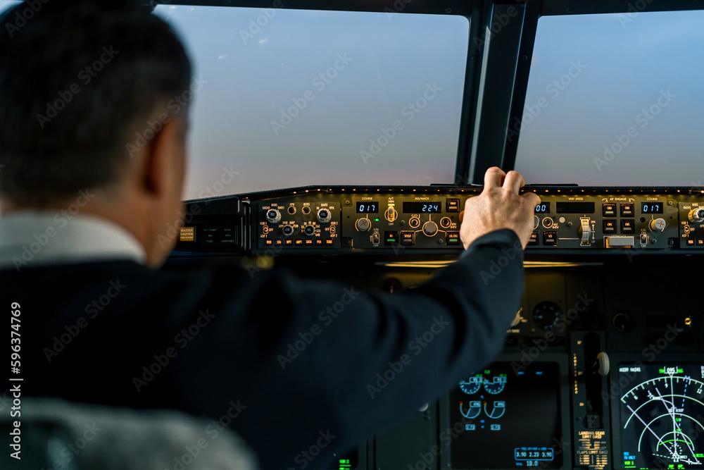 Commercial aircraft pilot adjusts aircraft flight parameters during ...