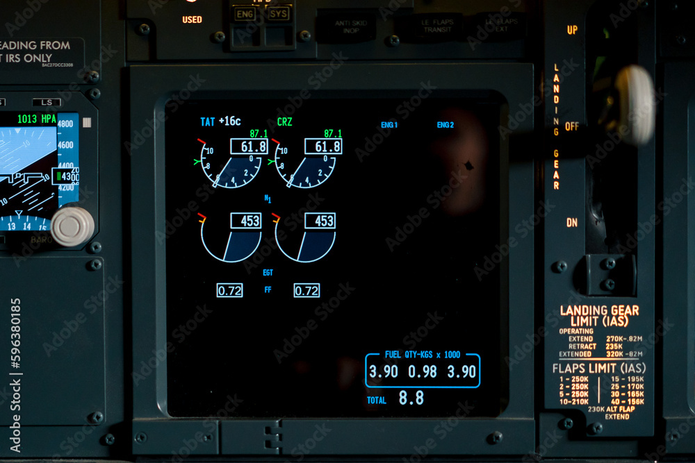 A detailed shot of the control and navigation panel in the cockpit of a ...