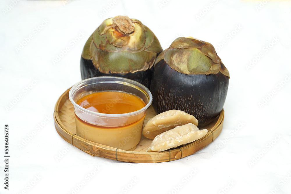Isolated toddy palm and Palmyra palm sugar, both types in bamboo ...