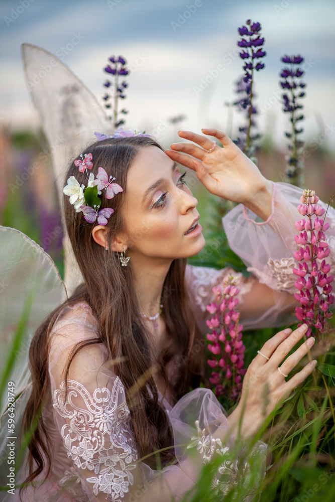 Beautiful romantic girl on nature field of flowers. Photo of sensual ...
