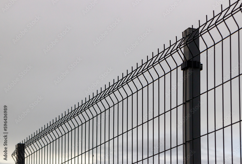 grating wire industrial fence panels. Panel fence Stock Photo | Adobe Stock