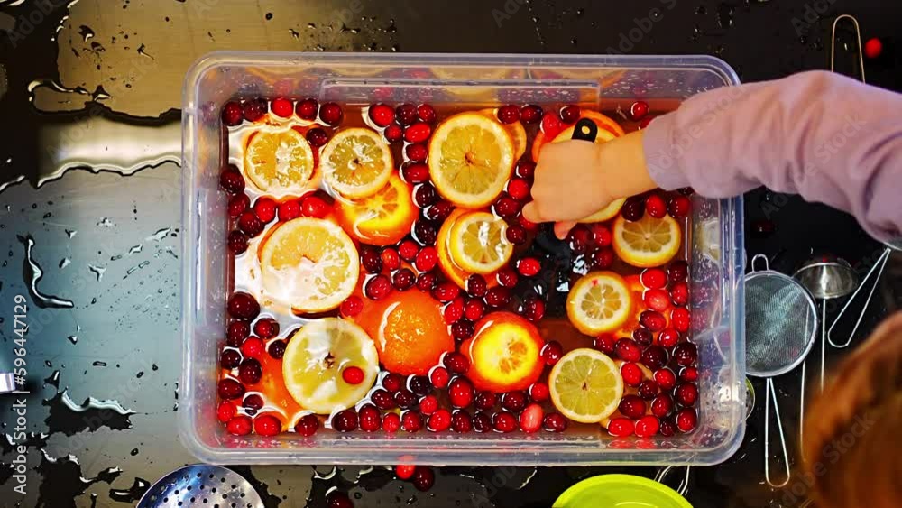 Kids playing in handmade fruit bar with kitchenware, berries and citrus ...