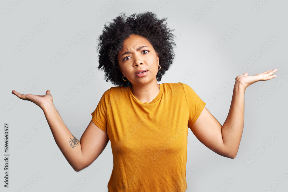 Confused, decision and portrait of African woman in studio with hand ...