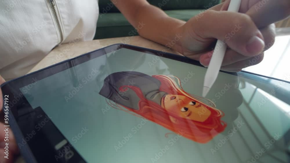 Digital artist draw pc tablet close up. Designer paint red head girl ...