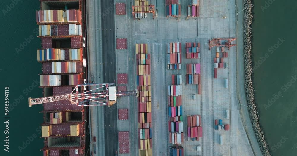 Straight down aerial.Containers and Container ships at the dock in a ...