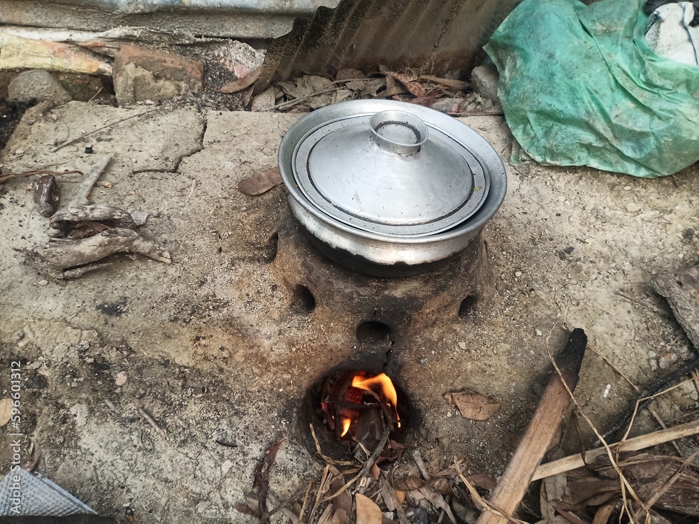Rural kitchen. Traditional stoves used by residents in rural India ...