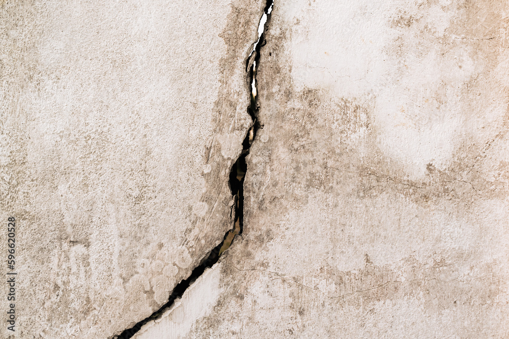 Railing cracks on the wall of the house. An image of a large cracked ...