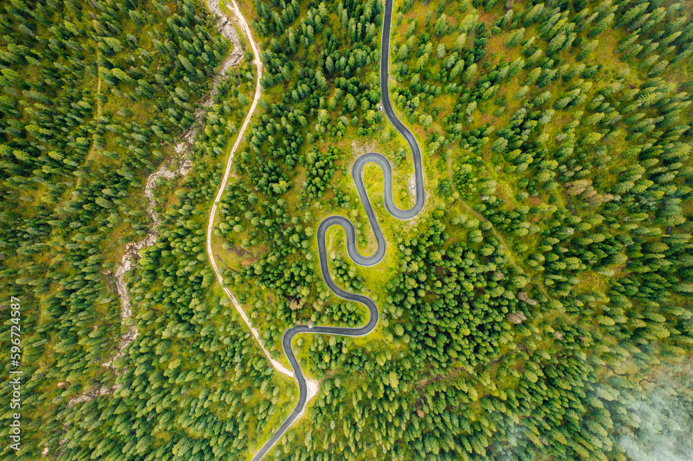 The famous Snake Road in the picturesque Giau Pass with a beautiful ...