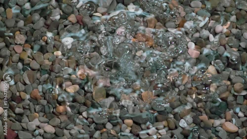 Video „Jet of Water Falls into a Puddle. A fine rain drips onto the ...