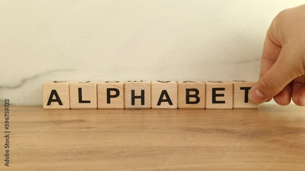 Word alphabet from wooden blocks. English language learning, education ...