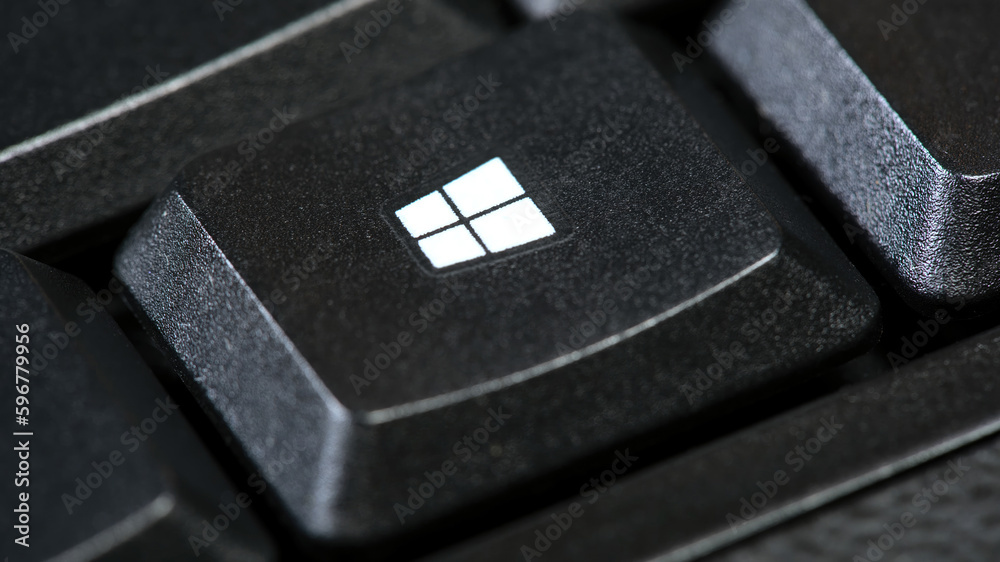 Microsoft Windows OS logo, operating system key on a simple black ...