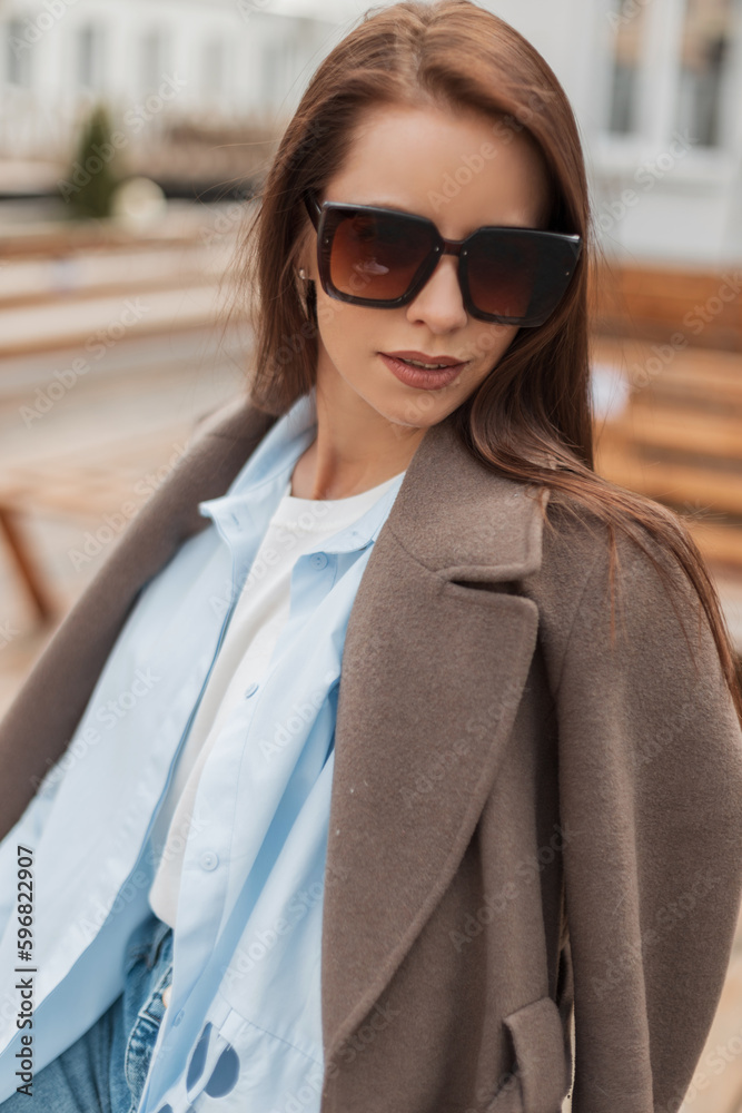 Beautiful young stylish woman model with vintage italian sunglasses in ...