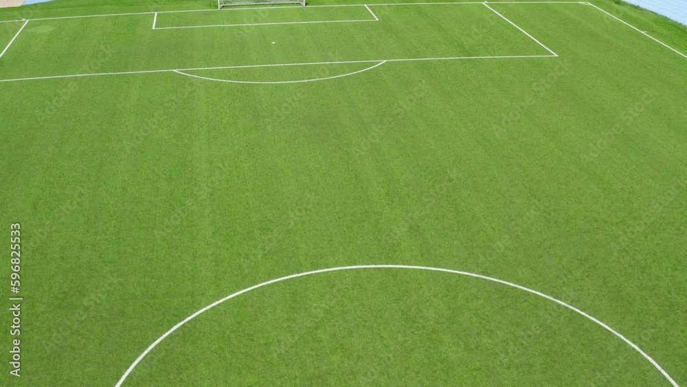 Aerial closeup of the penalty area and midfield circle on an empty ...