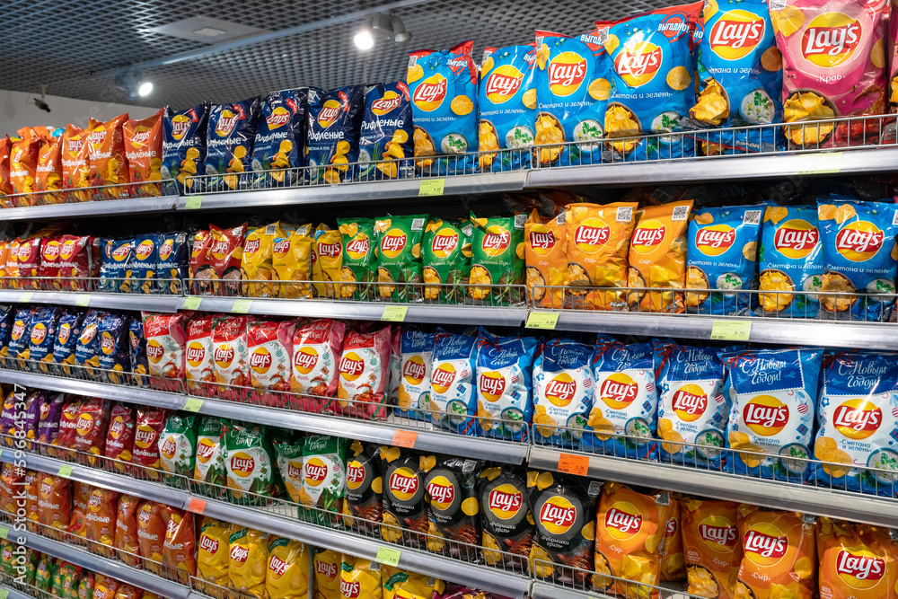 Various choice flavoured of lay's potato chips for sale in grocery ...