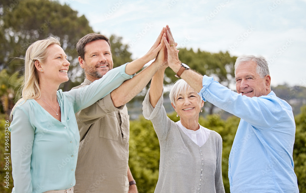 Rejoice with your family in the beautiful land. Shot of a family giving ...