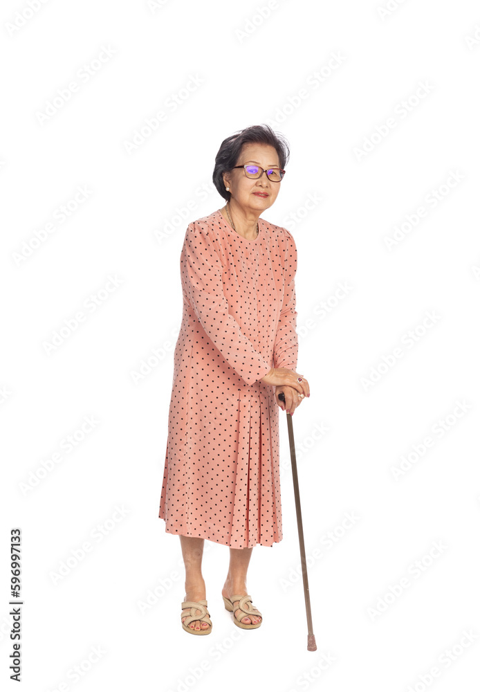 Old woman suffering from low back pain on a white background , standing ...
