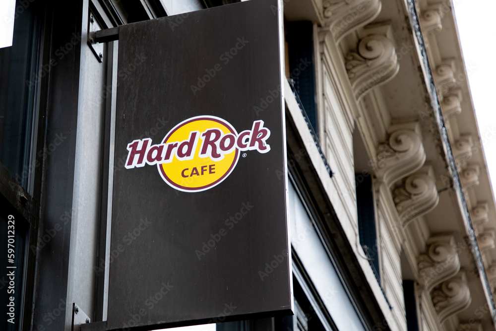 Hard Rock Cafe logo text and sign brand wall facade flag signboard ...
