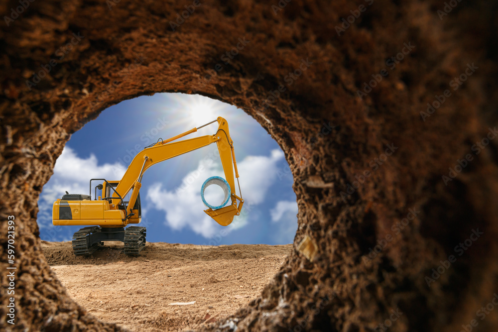 Crawler excavator are digging soil in the tunnel construction site ...
