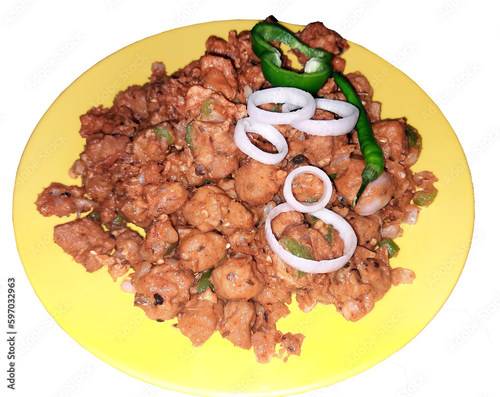 Tasty soya chucks wada Indian recipe on yellow plate and white ...